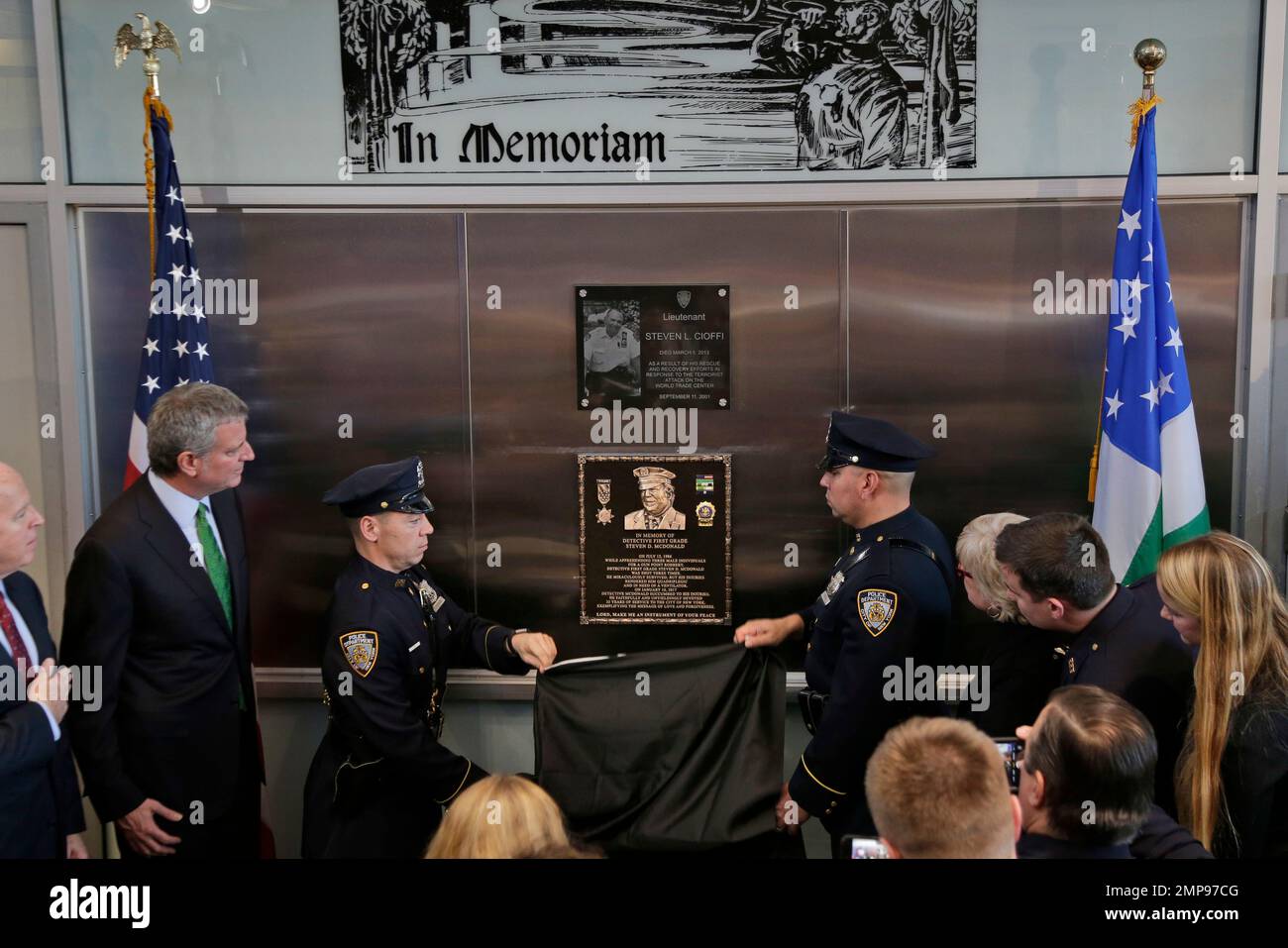 Police officers reveal a plaque for NYPD Detective Steven McDonald ...