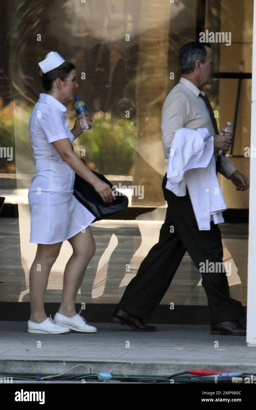 Actors prepare to shoot the asylum scenes on the set of "American ...