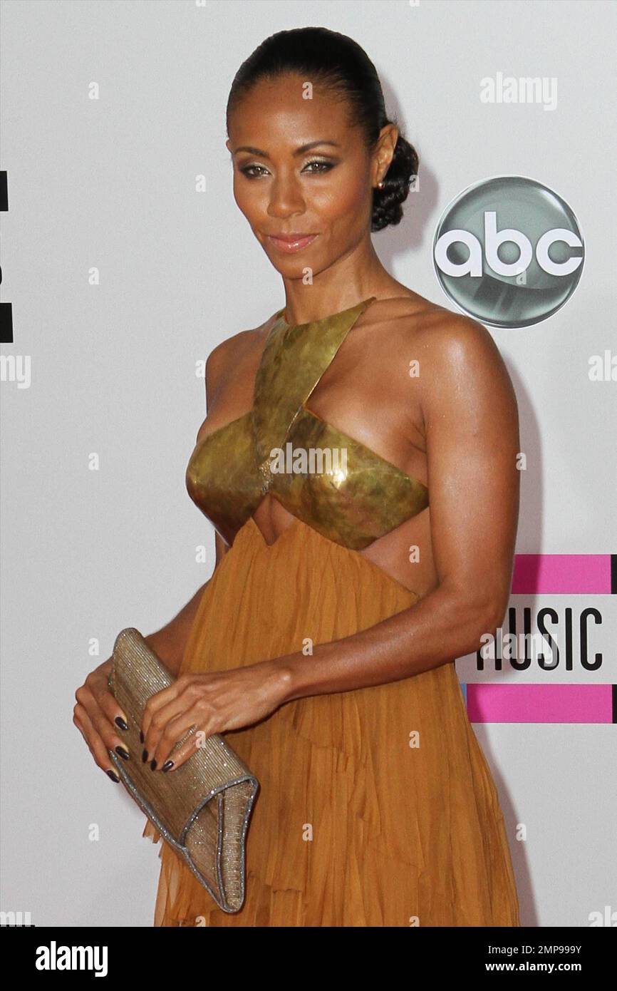 Gold metallic dress gown hi-res stock photography and images - Alamy