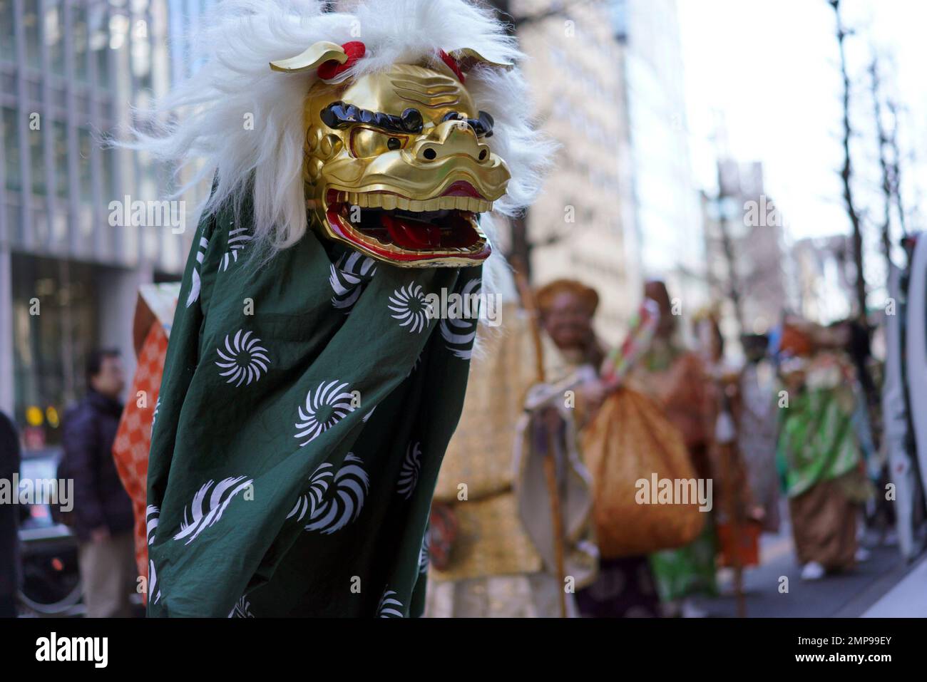 A lion dancer, known as Shishimai, performs ritual dance during First ...