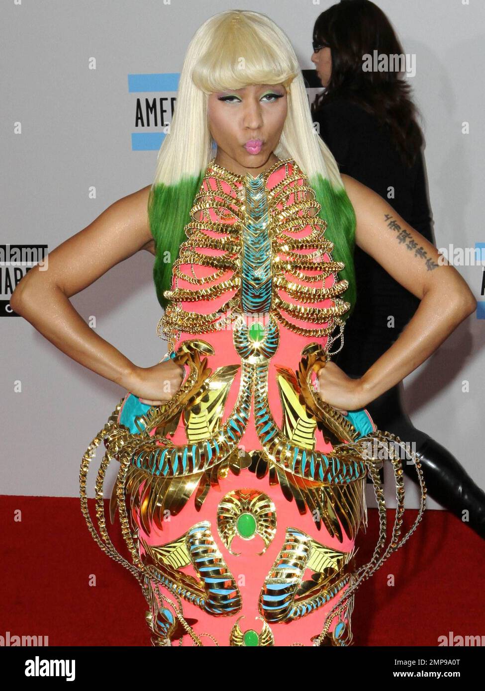 Nicki Minaj walks the red carpet at the 2010 American Music Awards at ...
