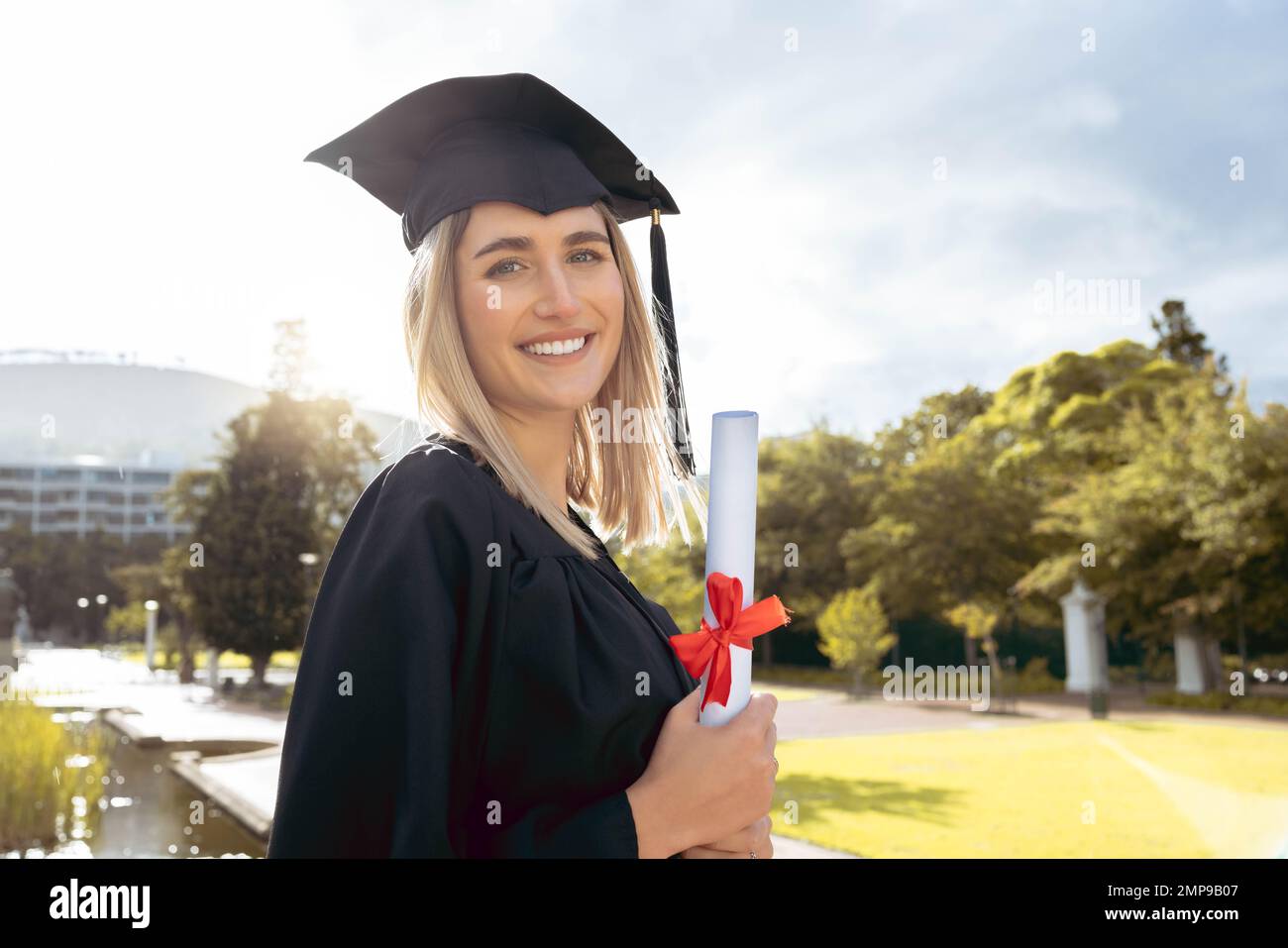 Woman, student and portrait smile of graduate with achievement in ...