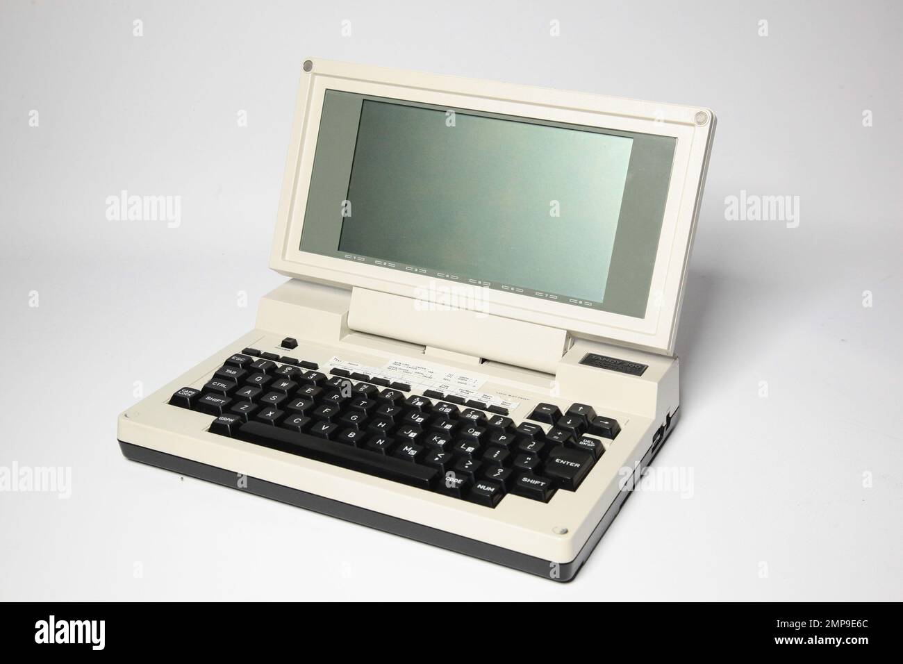 Portable computer in use by AP staff in the 1980s. (AP Photo/Corporate ...