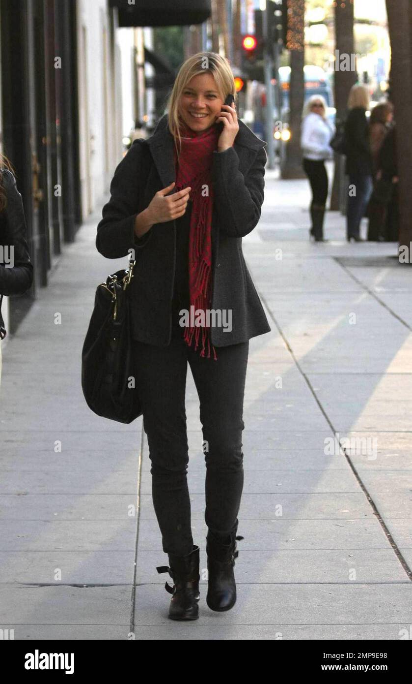 EXCLUSIVE!! Actress Amy Smart bundles up in a grey coat and red scarf ...