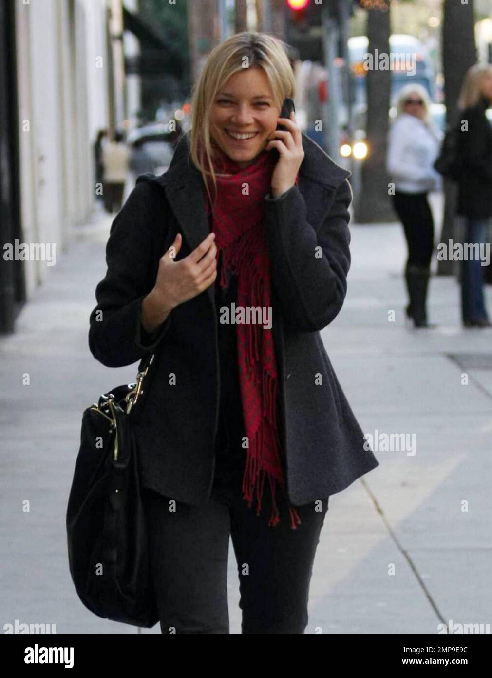 EXCLUSIVE!! Actress Amy Smart bundles up in a grey coat and red scarf ...