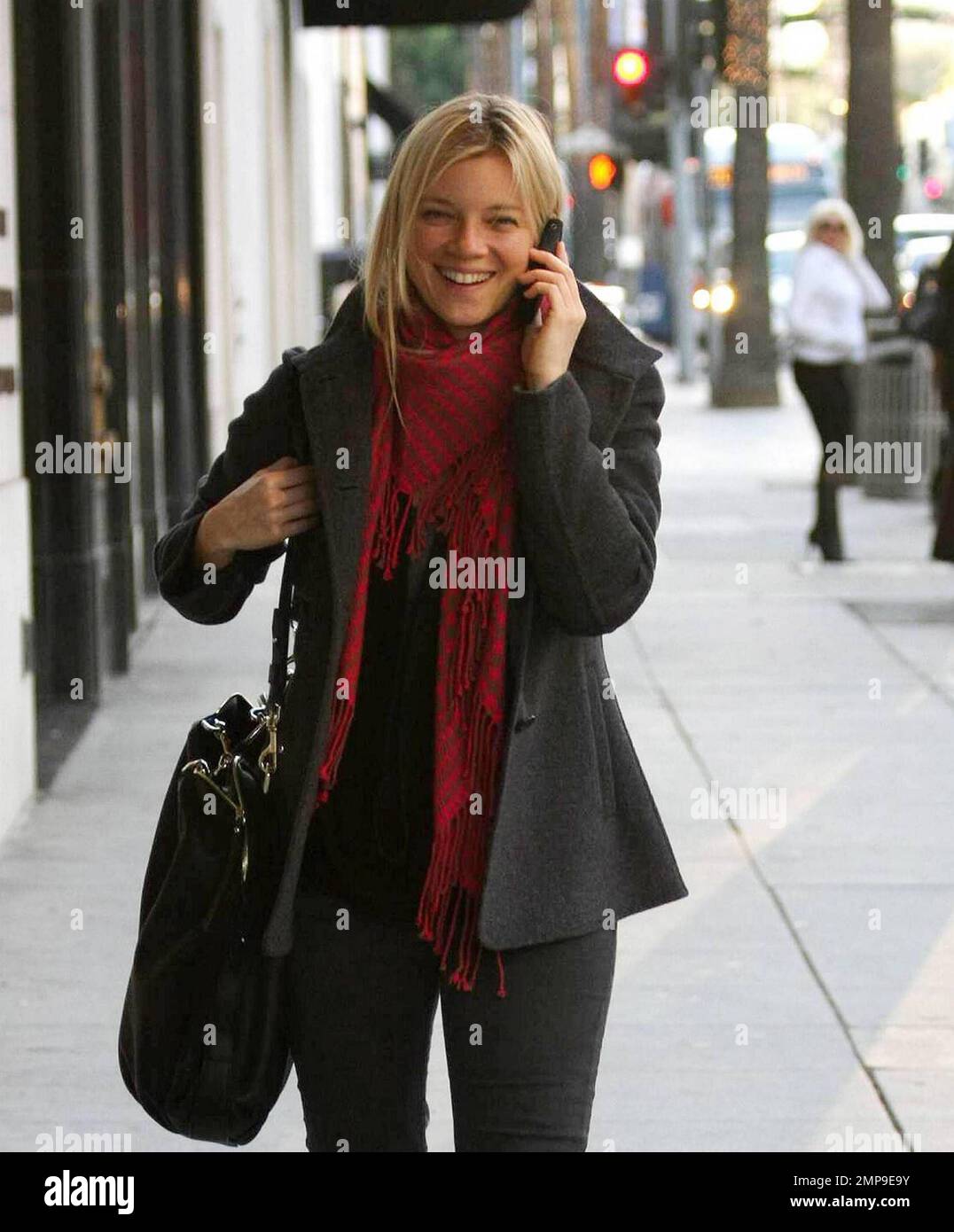 EXCLUSIVE!! Actress Amy Smart bundles up in a grey coat and red scarf ...