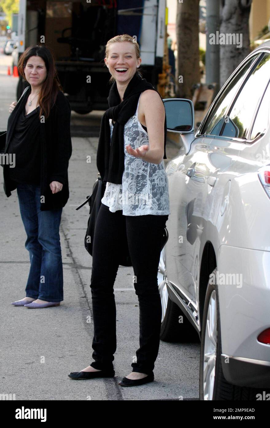 Actress Amy Smart is all laughs as she leaves Madeo's restaurant with a ...