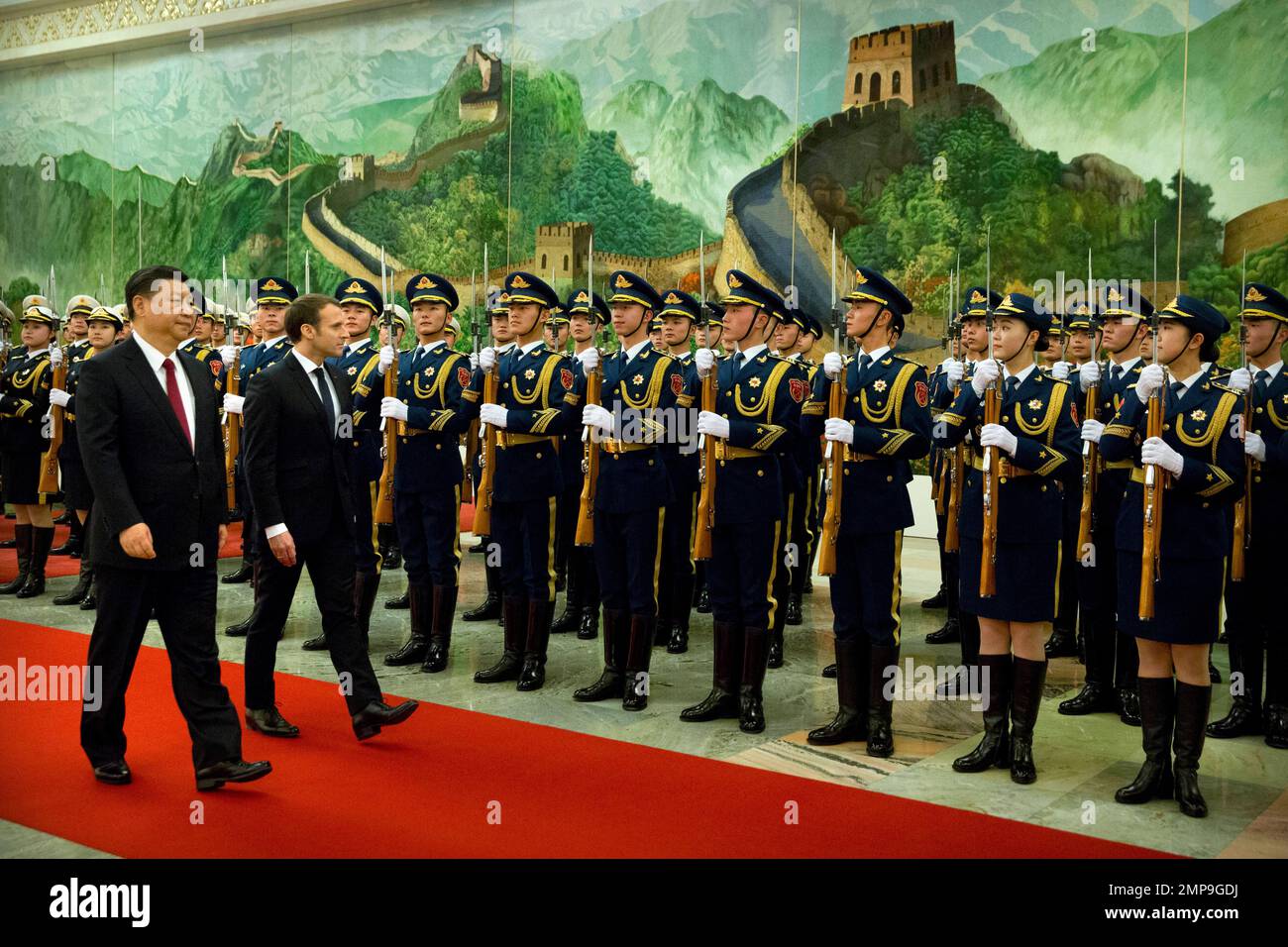 Chinese President Xi Jinping, left, and French President Emmanuel ...
