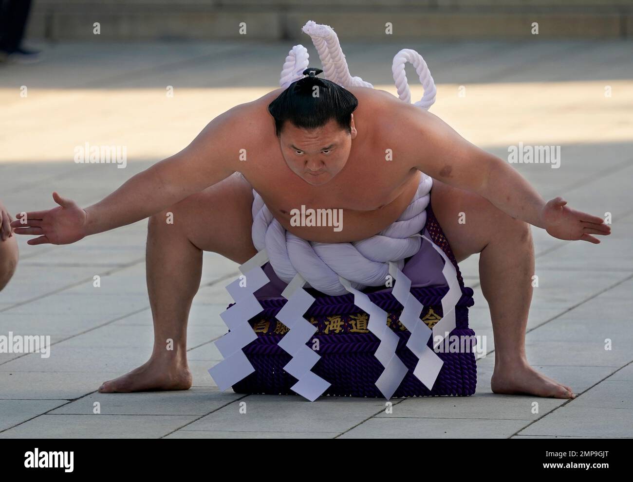 Sumo grand champion Hakuho of Mongolia performs his ring entry form at ...