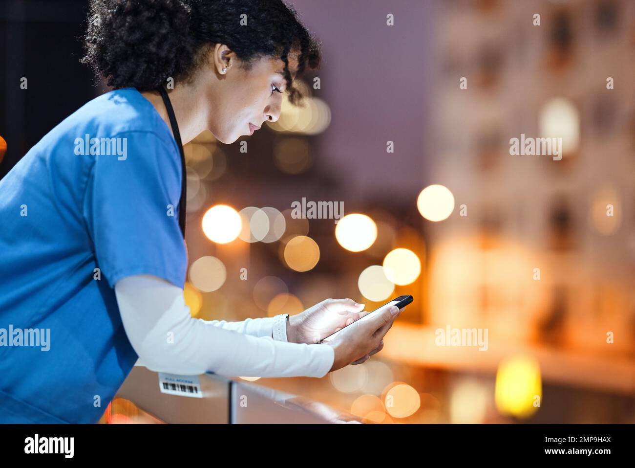 Night, doctor and woman texting in city while on a break, internet and ...