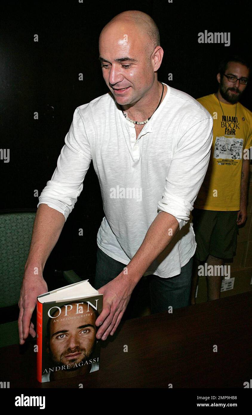 Tennis great Andre Agassi signs copies of his new book "Open: An ...