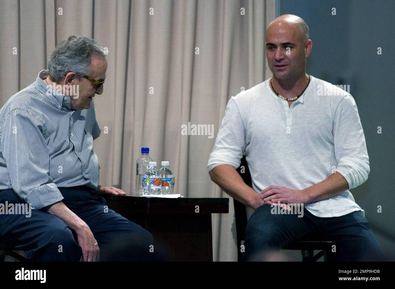 Tennis great Andre Agassi signs copies of his new book "Open: An ...