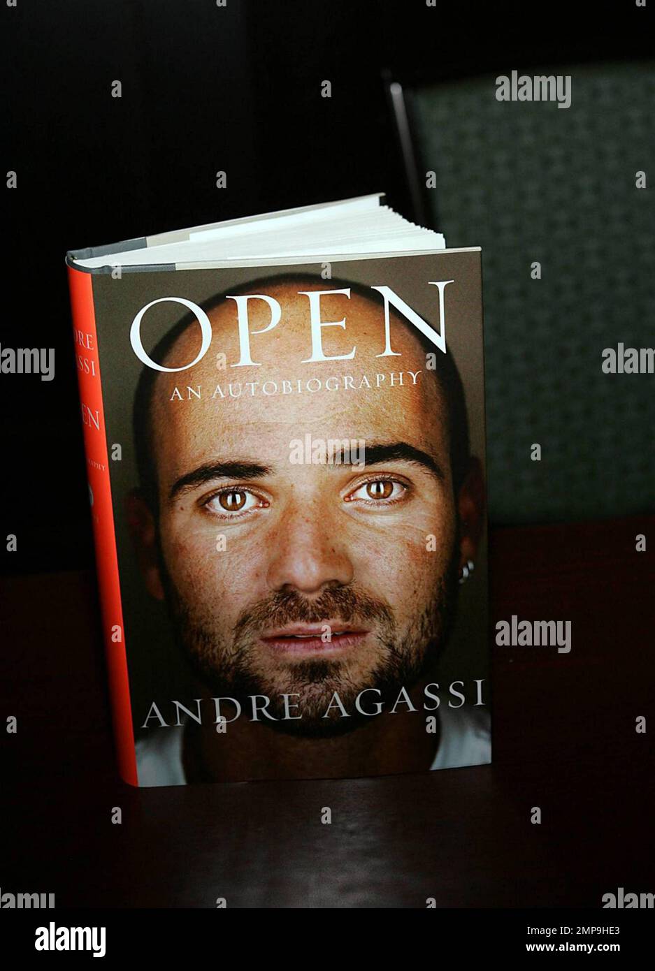 Tennis great Andre Agassi signs copies of his new book "Open: An ...