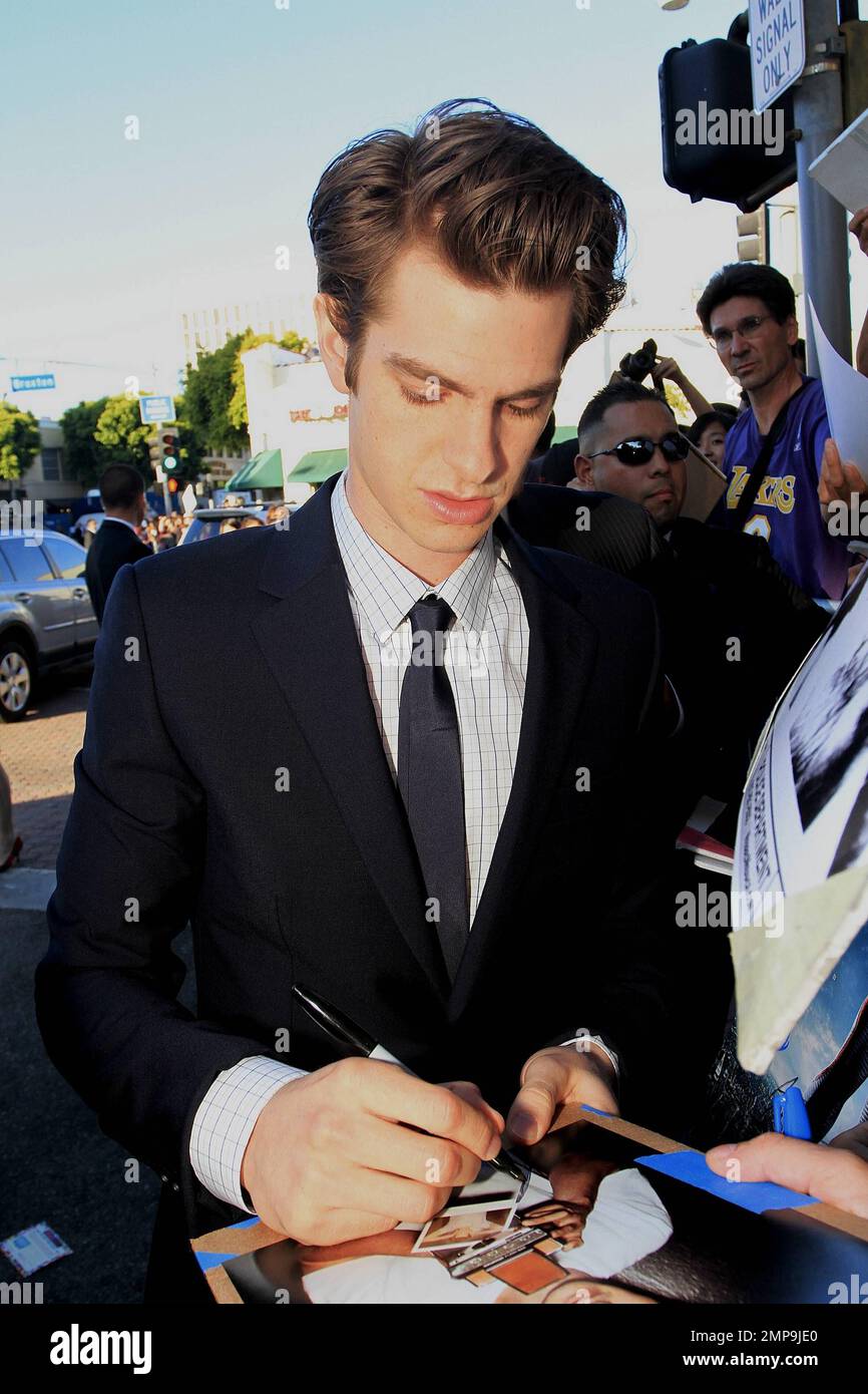 Andrew Garfield signs autographs as he arrives to the Los Angeles ...