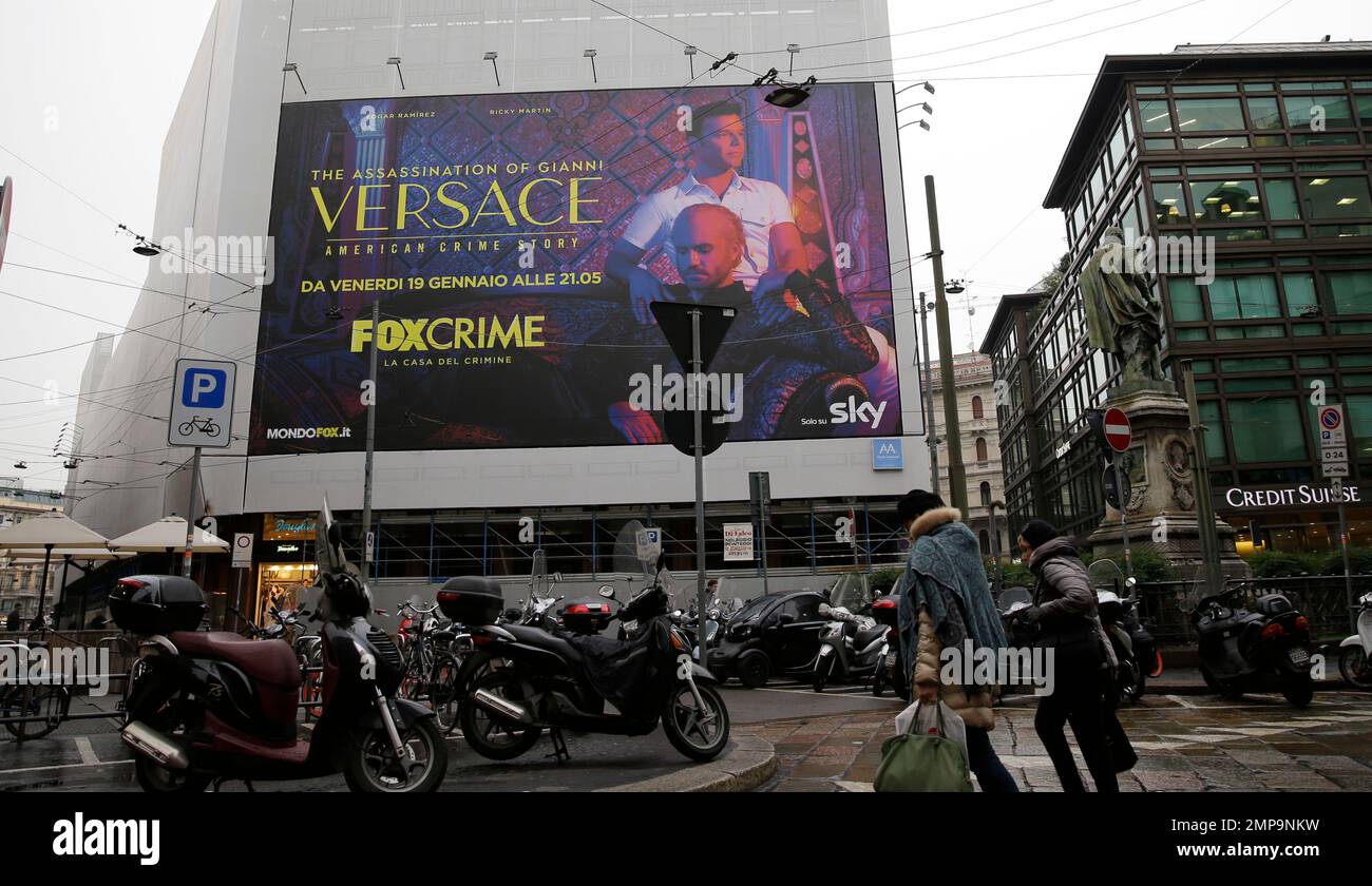 People walk past a giant poster advertising the 'American Crime Story ...