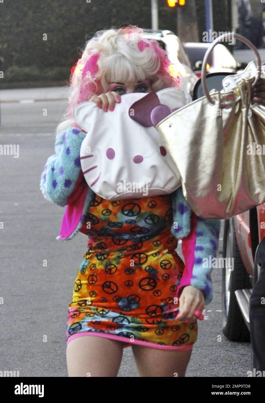 Model and actress Angelyne wears a wildly colorful and outrageous ...