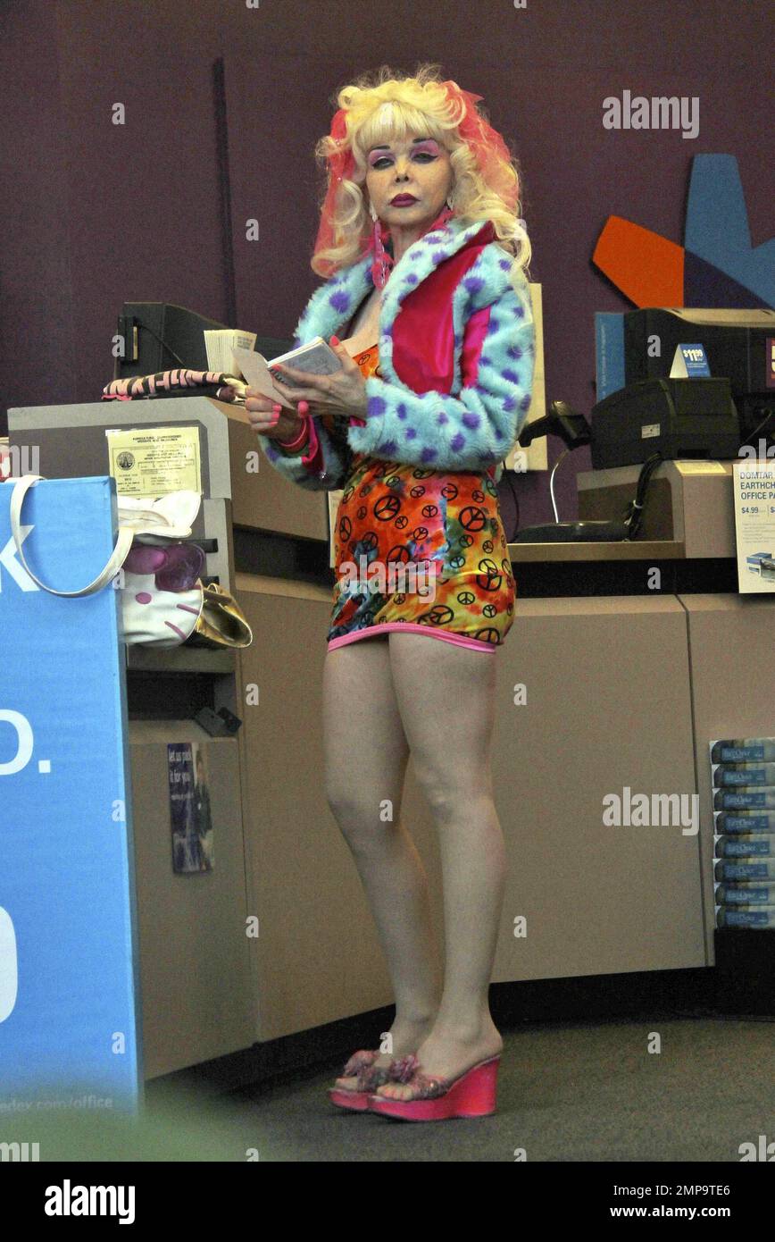 Model and actress Angelyne wears a wildly colorful and outrageous ...