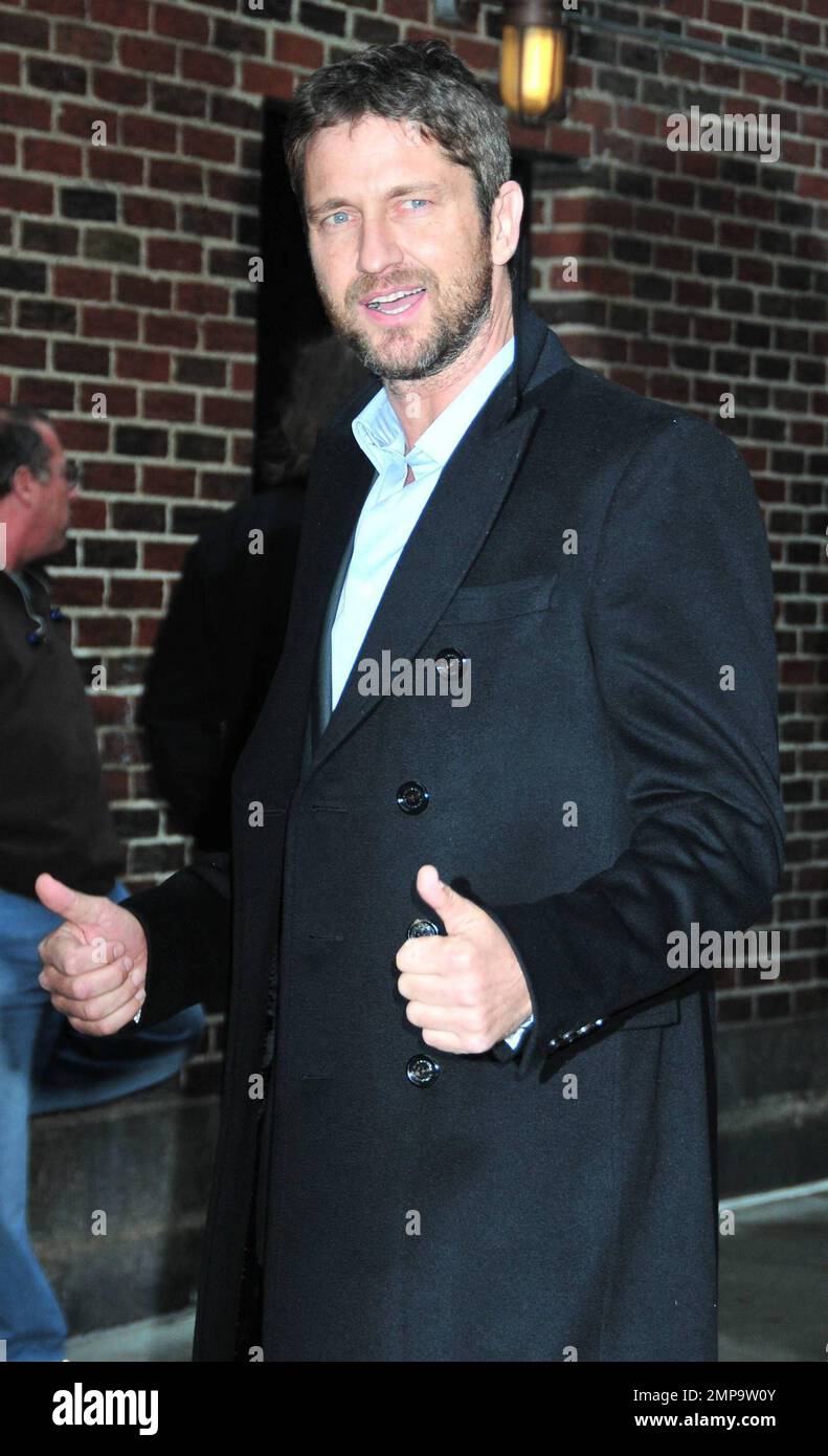 Gerard Butler poses for photos outside the "Late Show with David ...