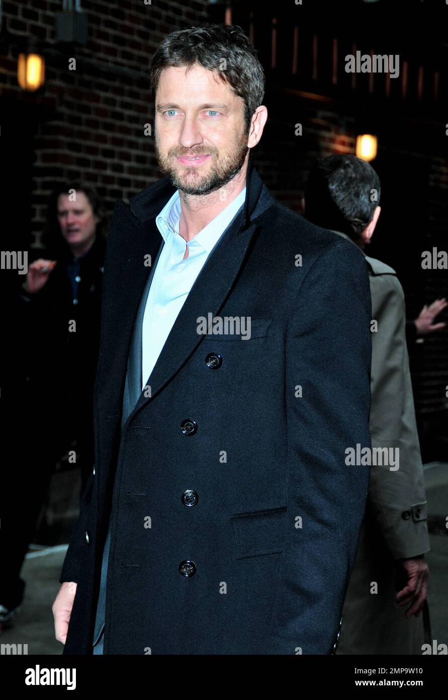 Gerard Butler poses for photos outside the "Late Show with David ...