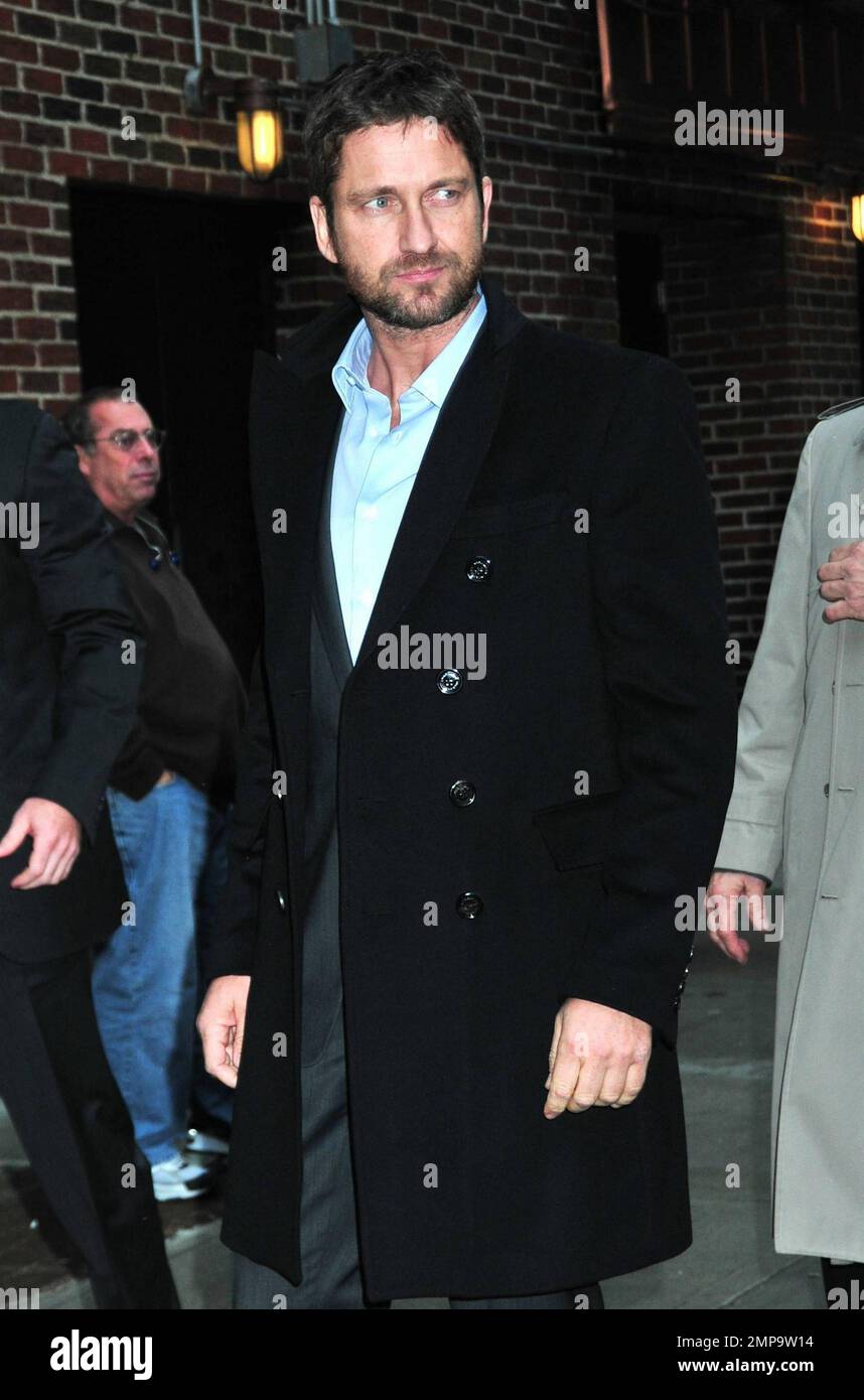Gerard Butler poses for photos outside the "Late Show with David ...