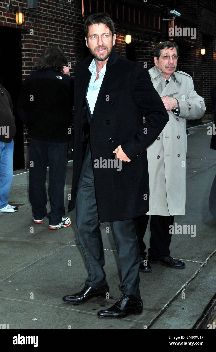 Gerard Butler poses for photos outside the "Late Show with David ...