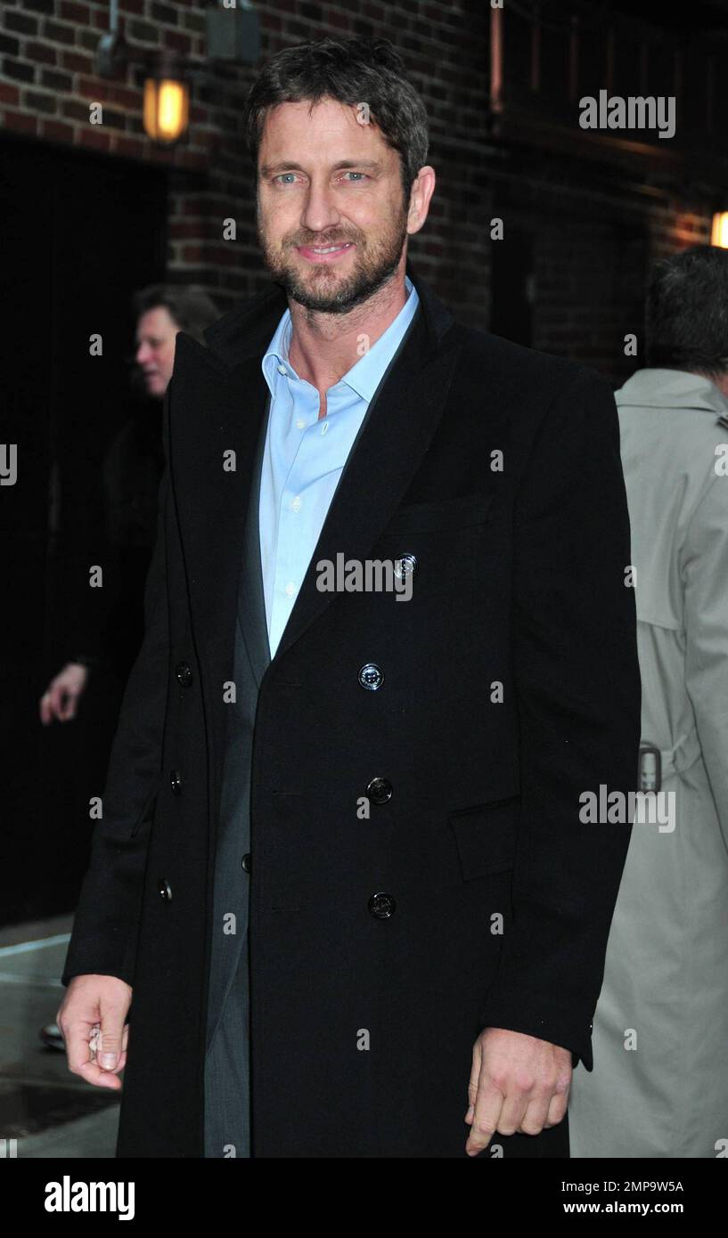 Gerard Butler poses for photos outside the "Late Show with David ...