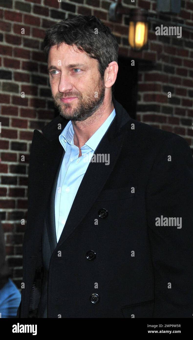 Gerard Butler poses for photos outside the "Late Show with David ...