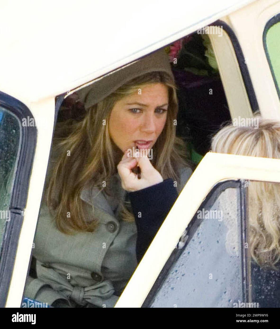 Exclusive!! Actress Jennifer Aniston has her makeup retouched on the ...