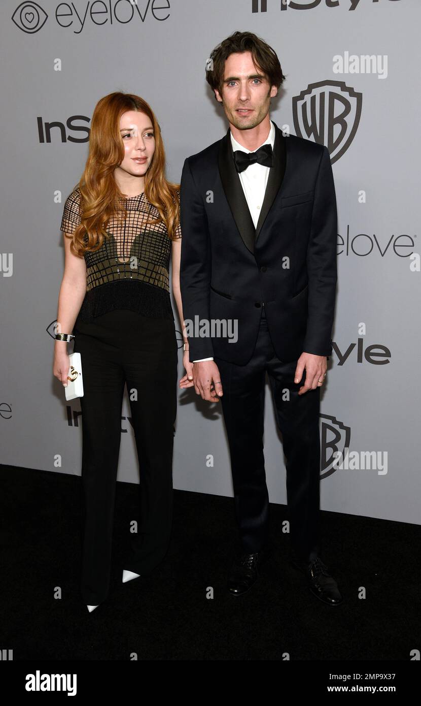 Elena Satine, left, and Tyson Ritter arrive at the InStyle and Warner ...