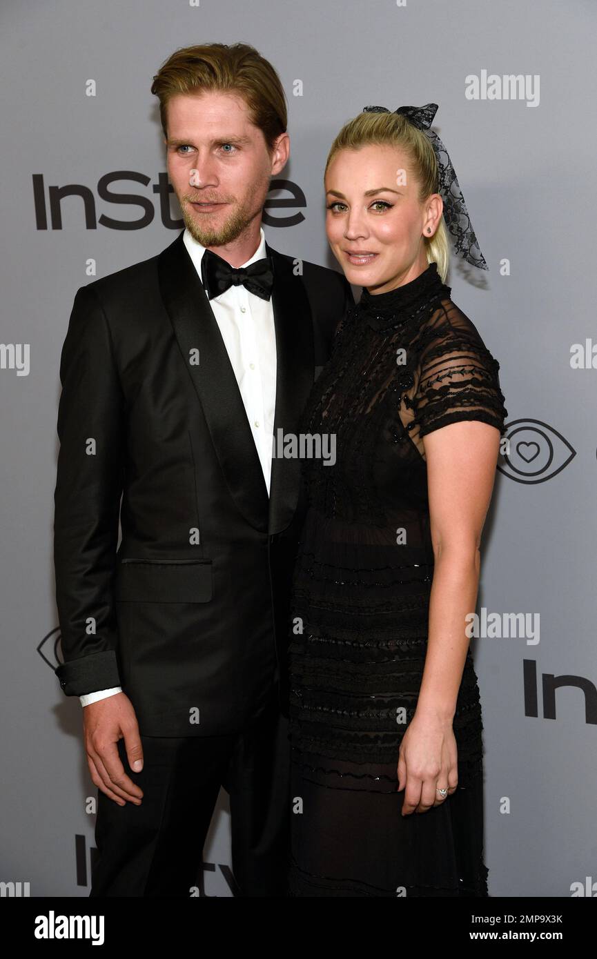 Karl Cook, left, and Kaley Cuoco arrives at the InStyle and Warner Bros ...