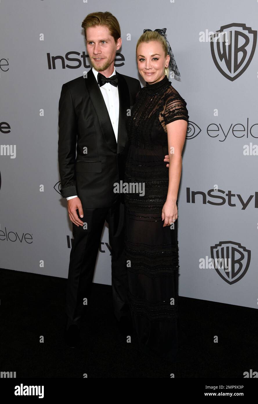Karl Cook, left, and Kaley Cuoco arrives at the InStyle and Warner Bros ...