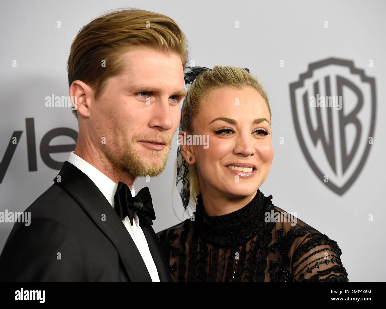 Karl Cook, left, and Kaley Cuoco arrive at the InStyle and Warner Bros ...