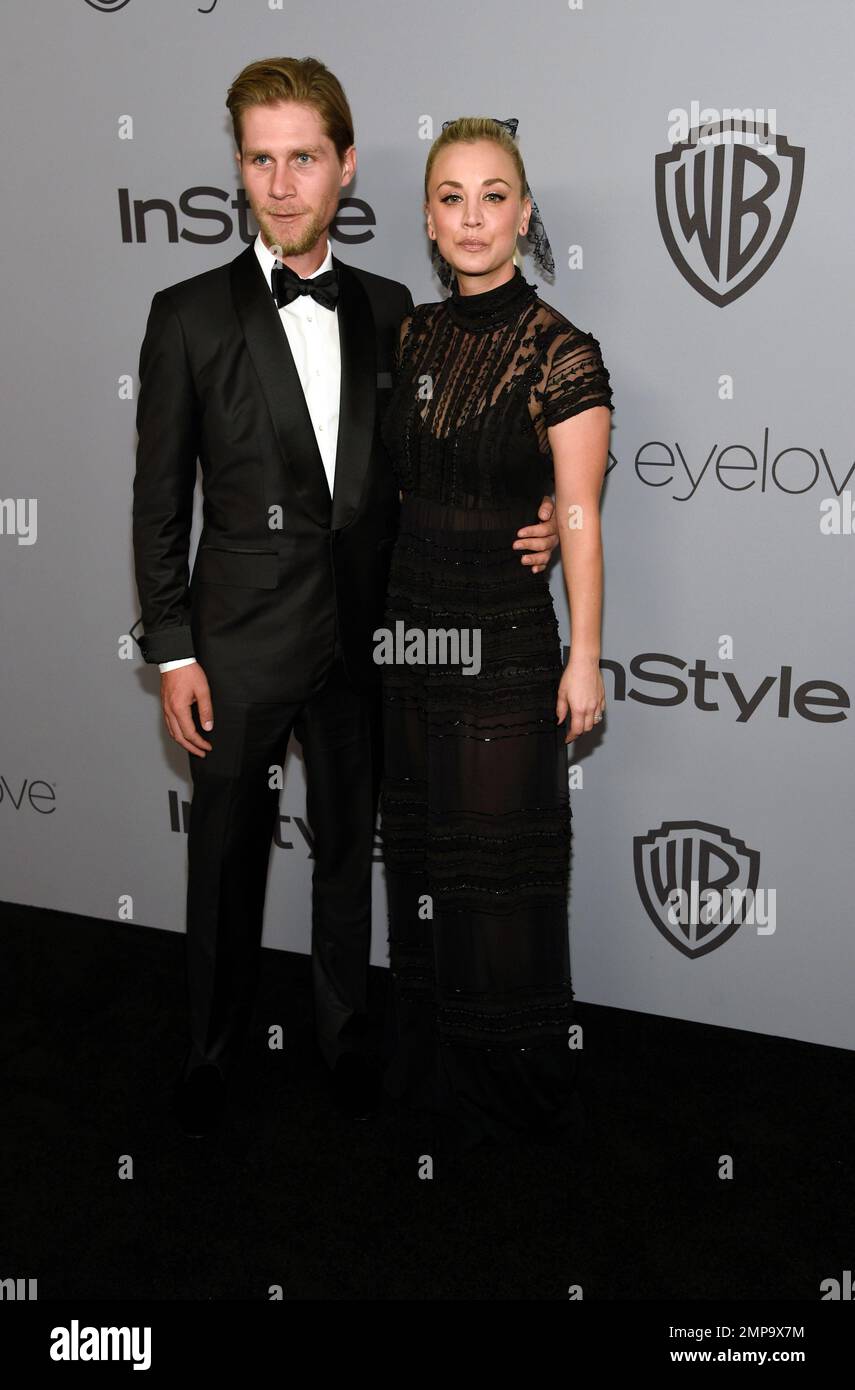 Karl Cook, left, and Kaley Cuoco arrive at the InStyle and Warner Bros ...