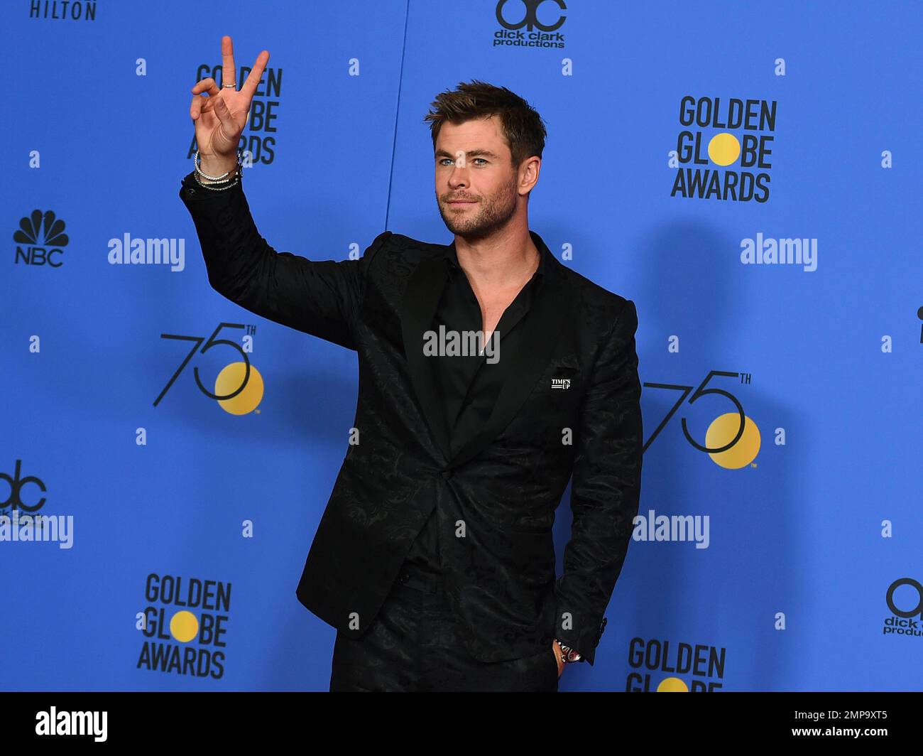 Chris Hemsworth poses in the press room at the 75th annual Golden Globe ...