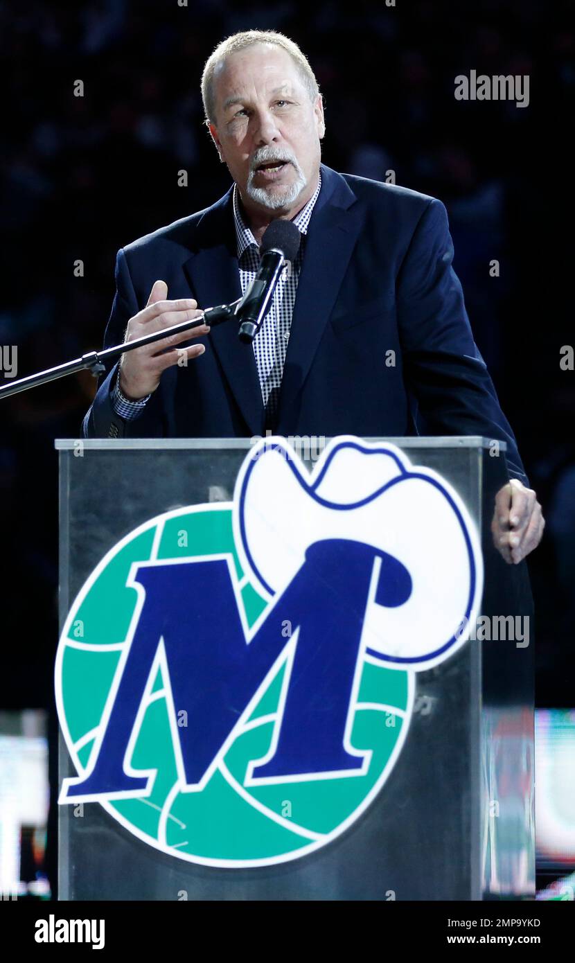 Former Dallas Mavericks player Brad Davis speaks during a jersey number ...