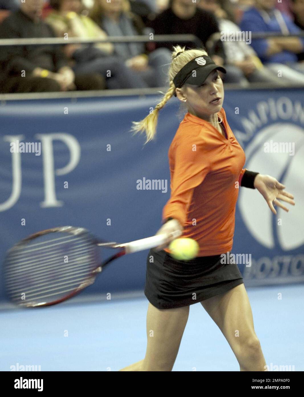 Tennis champion Anna Kournikova plays in a mixed doubles match on ...