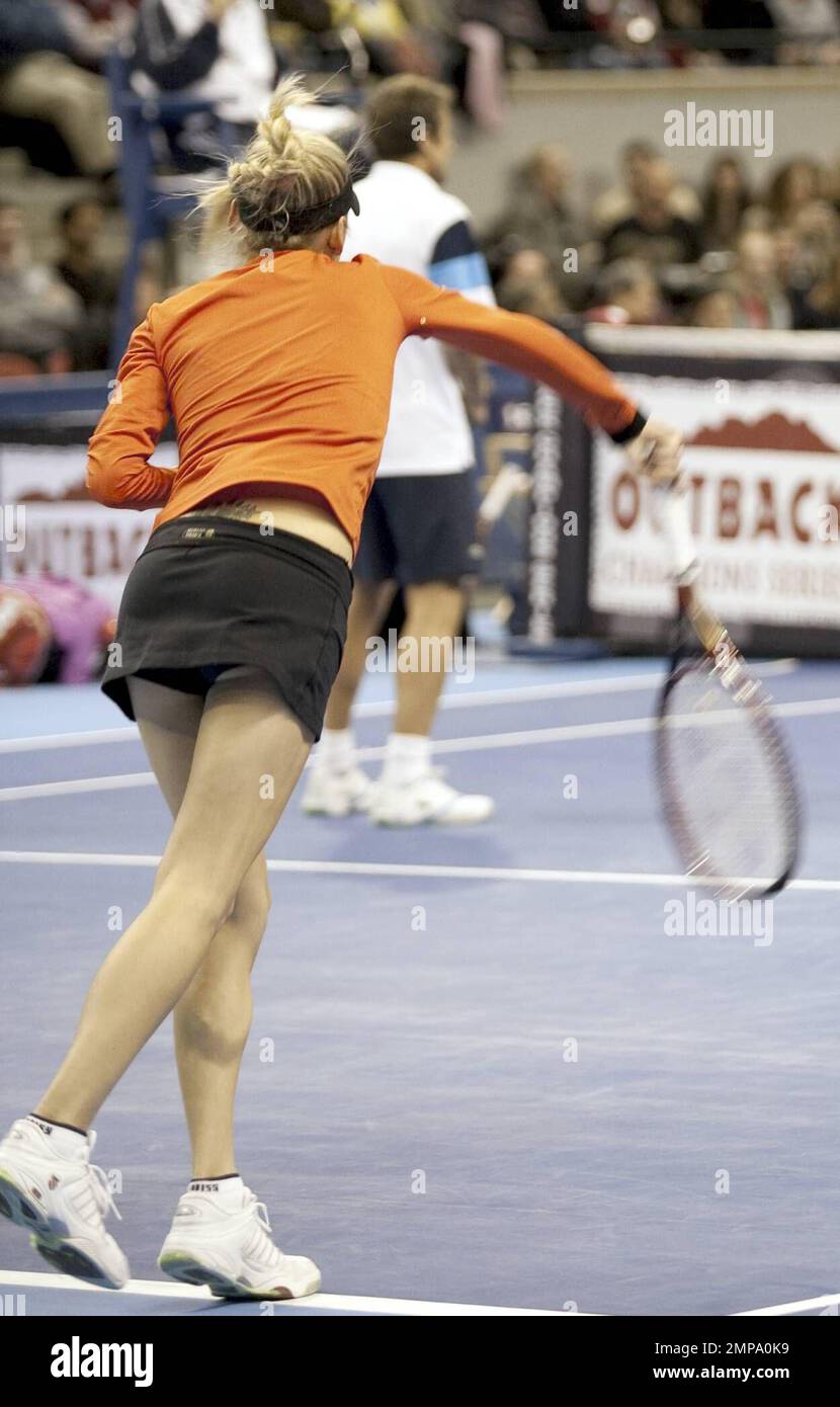 Tennis champion Anna Kournikova plays in a mixed doubles match on ...