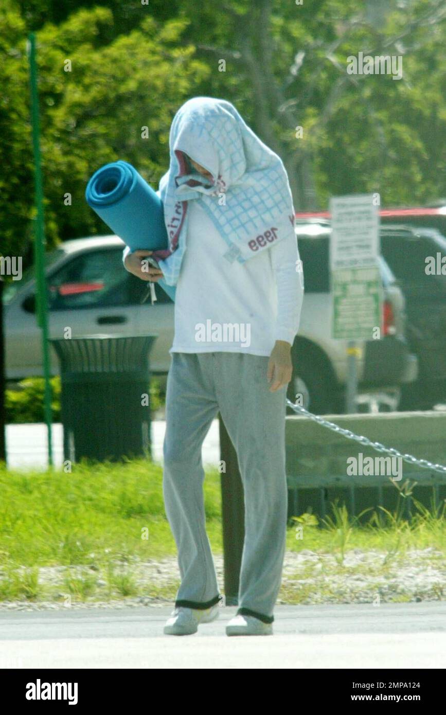 Exclusive!! Anna Kournikova has either had a hard workout or is hiding ...