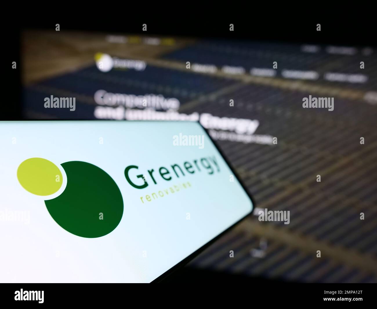 Mobile phone with logo of energy company Grenergy Renovables S.A. on ...