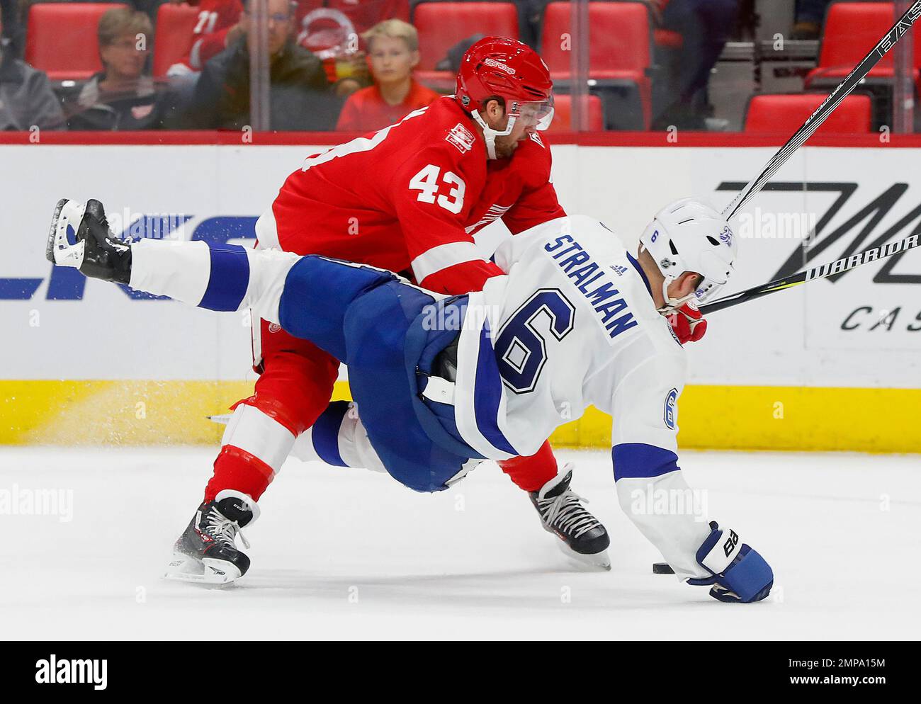 Detroit Red Wings left wing Darren Helm (43) checks Tampa Bay Lightning ...