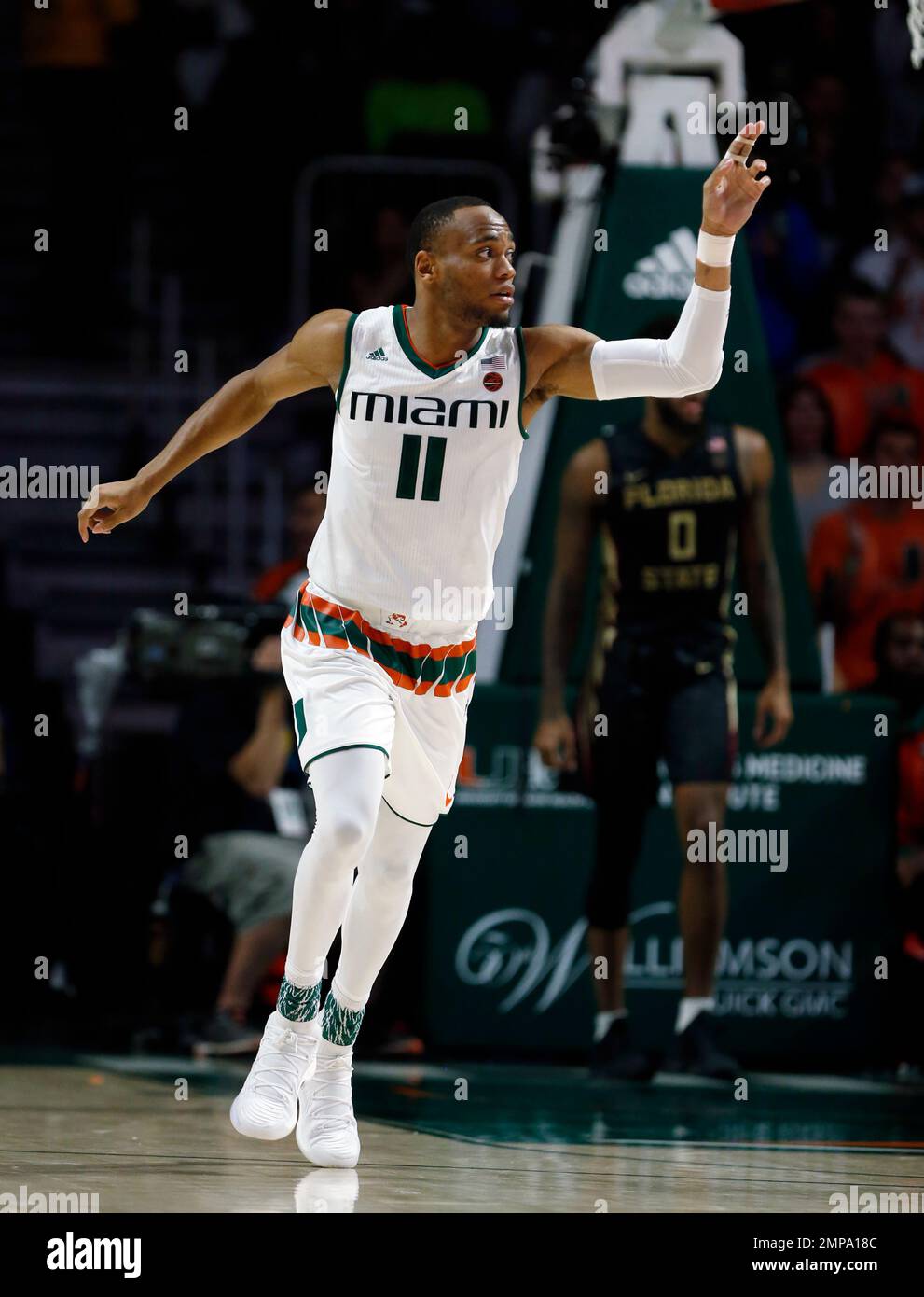 Miami guard Bruce Brown Jr. celebrates after scoring during the second ...