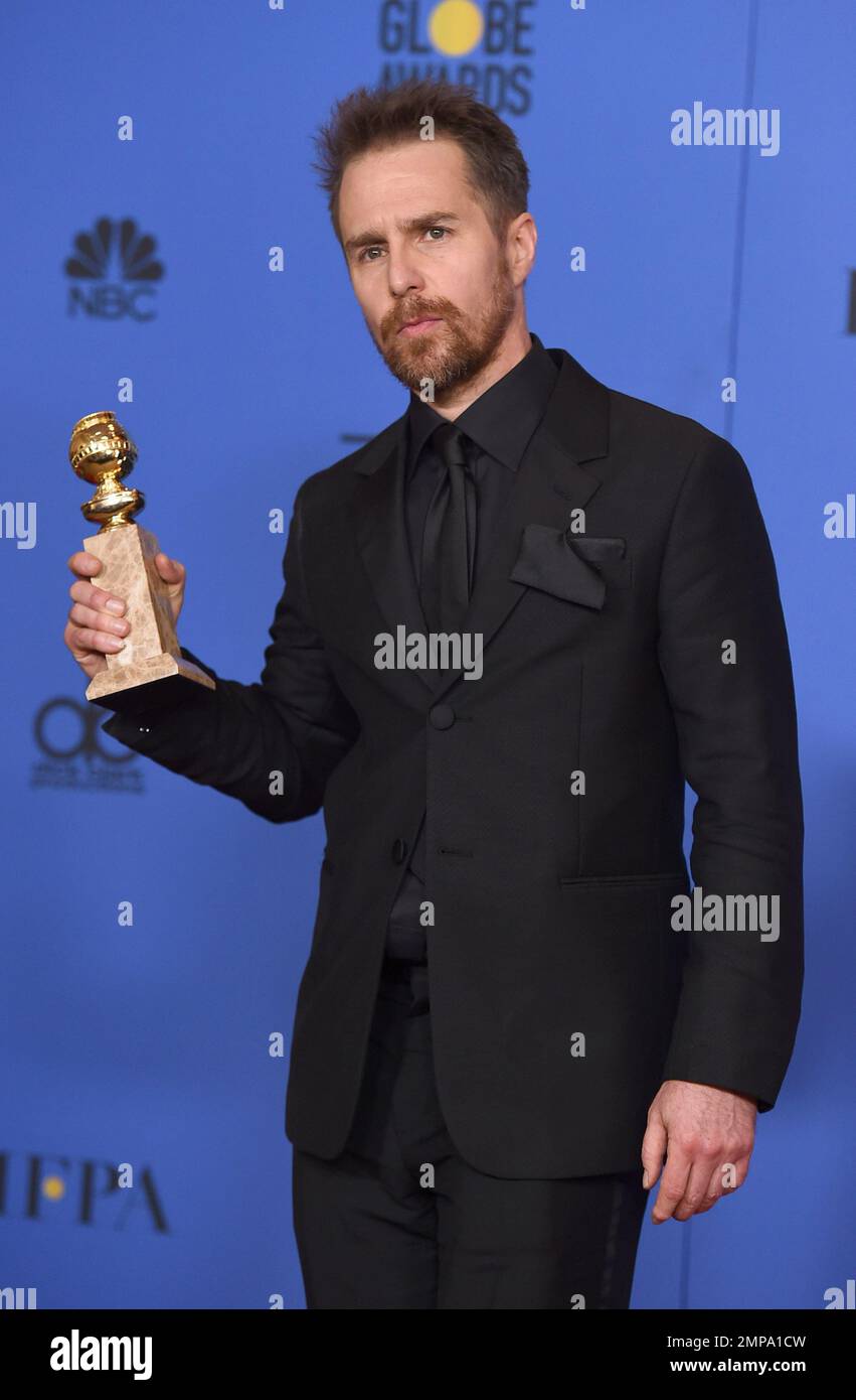 Sam Rockwell poses in the press room with the award for best ...