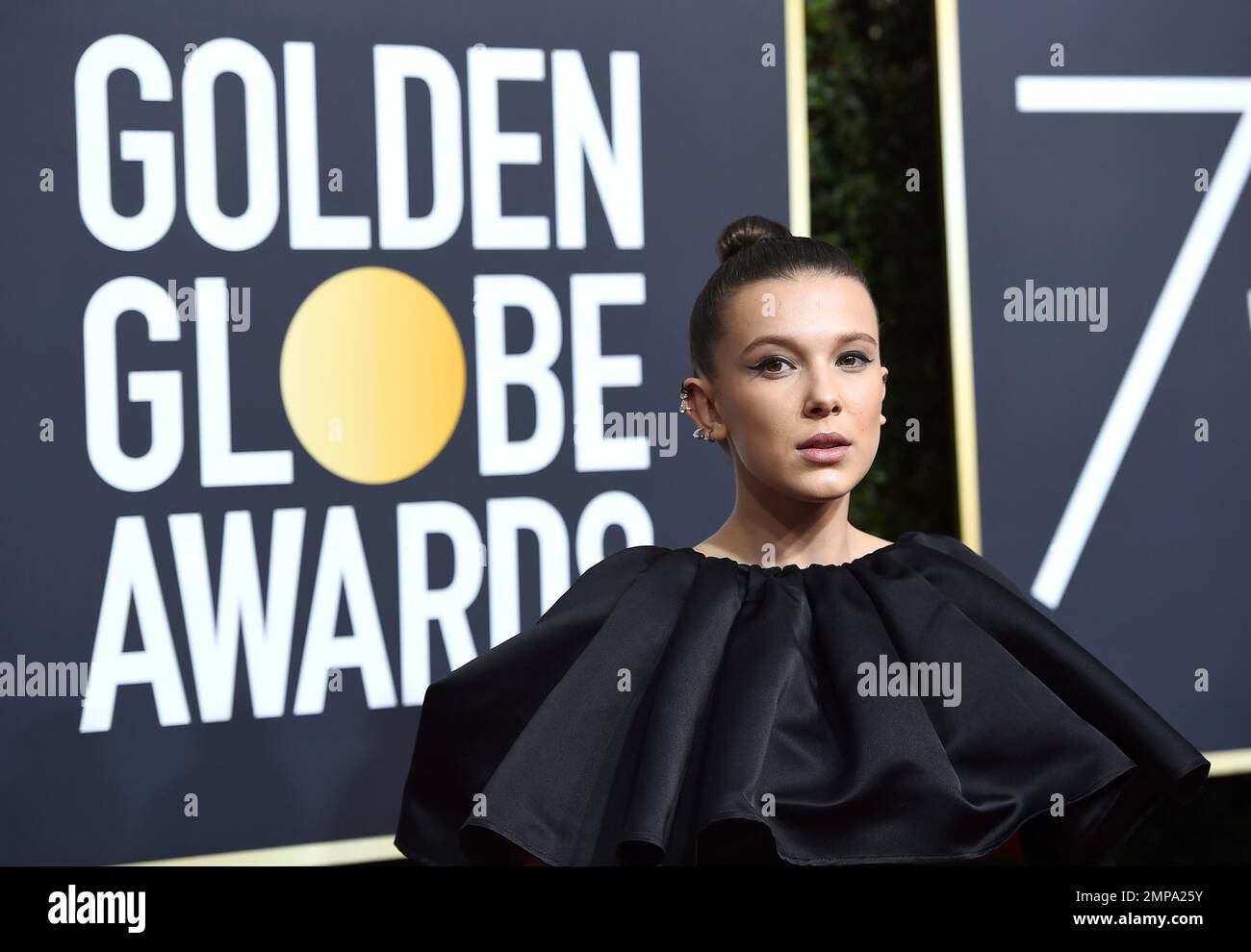 Millie Bobby Brown arrives at the 75th annual Golden Globe Awards at ...
