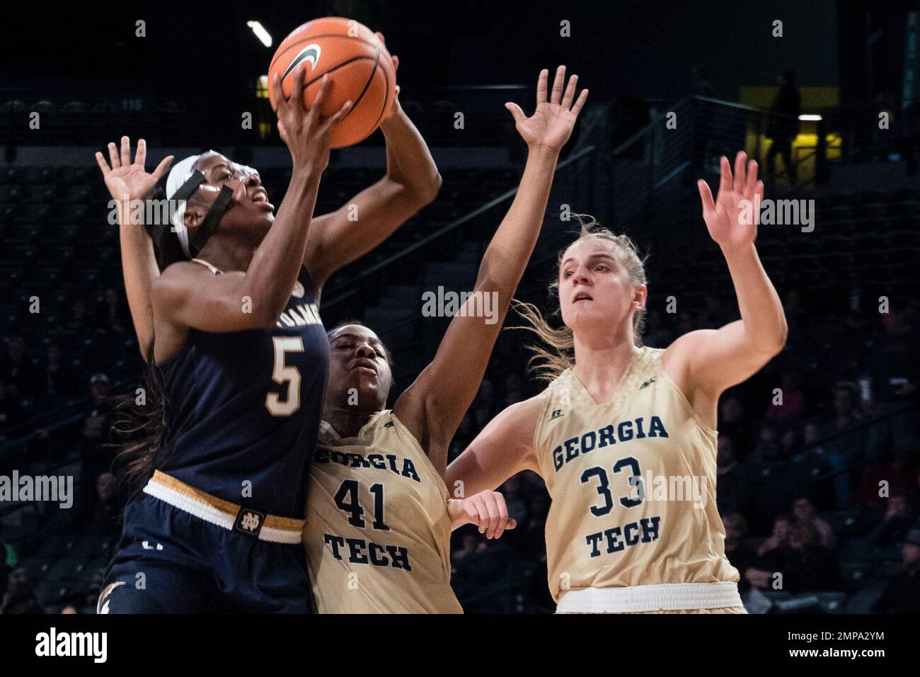 Notre Dame guard Jackie Young shoots as Georgia Tech guard Kierra ...