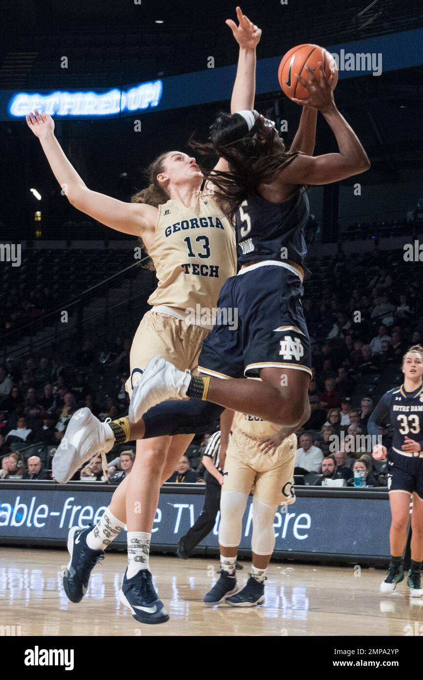 Notre Dame guard Jackie Young (5) shoots as Georgia Tech forward Lorela ...