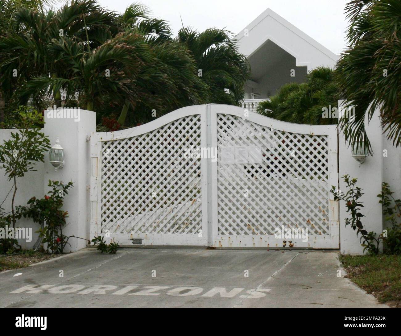 Photos showing posted notices where electricity, water, sewage have been cut off in the home ...