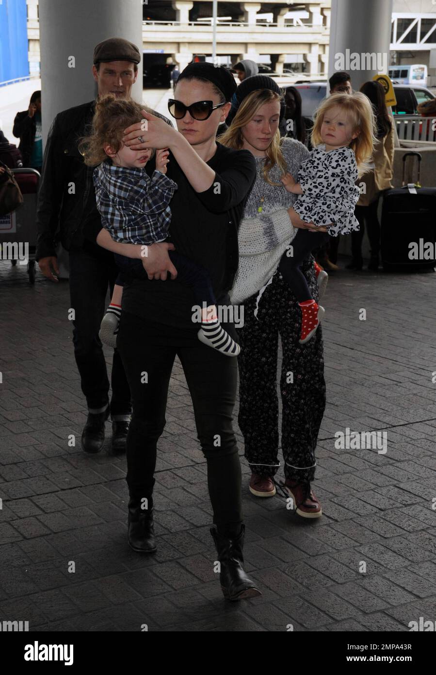 Anna Paquin and Stephen Moyer with twins Charlie and Poppy at LAX ...