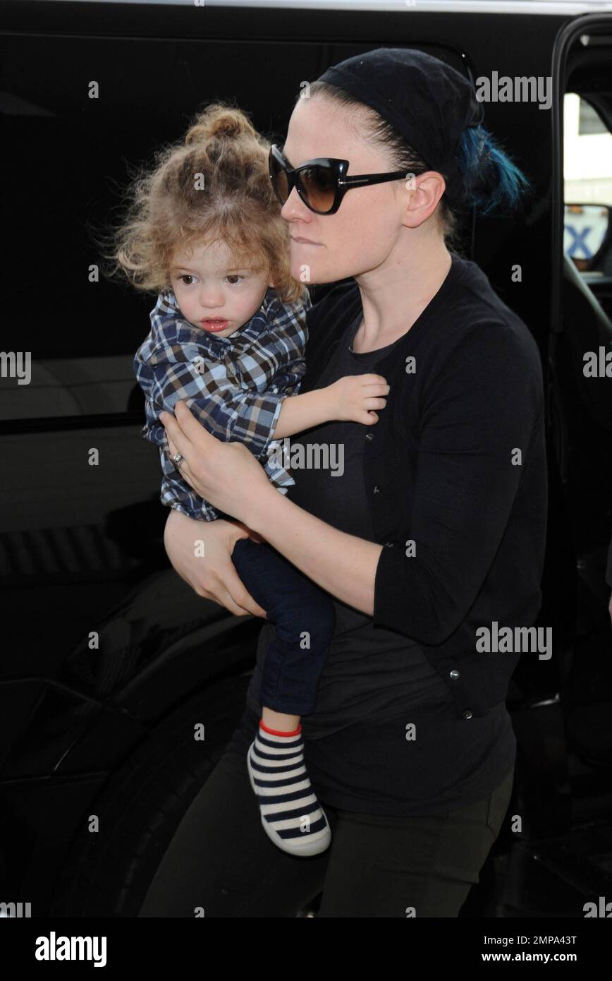 Anna Paquin and Stephen Moyer with twins Charlie and Poppy at LAX ...