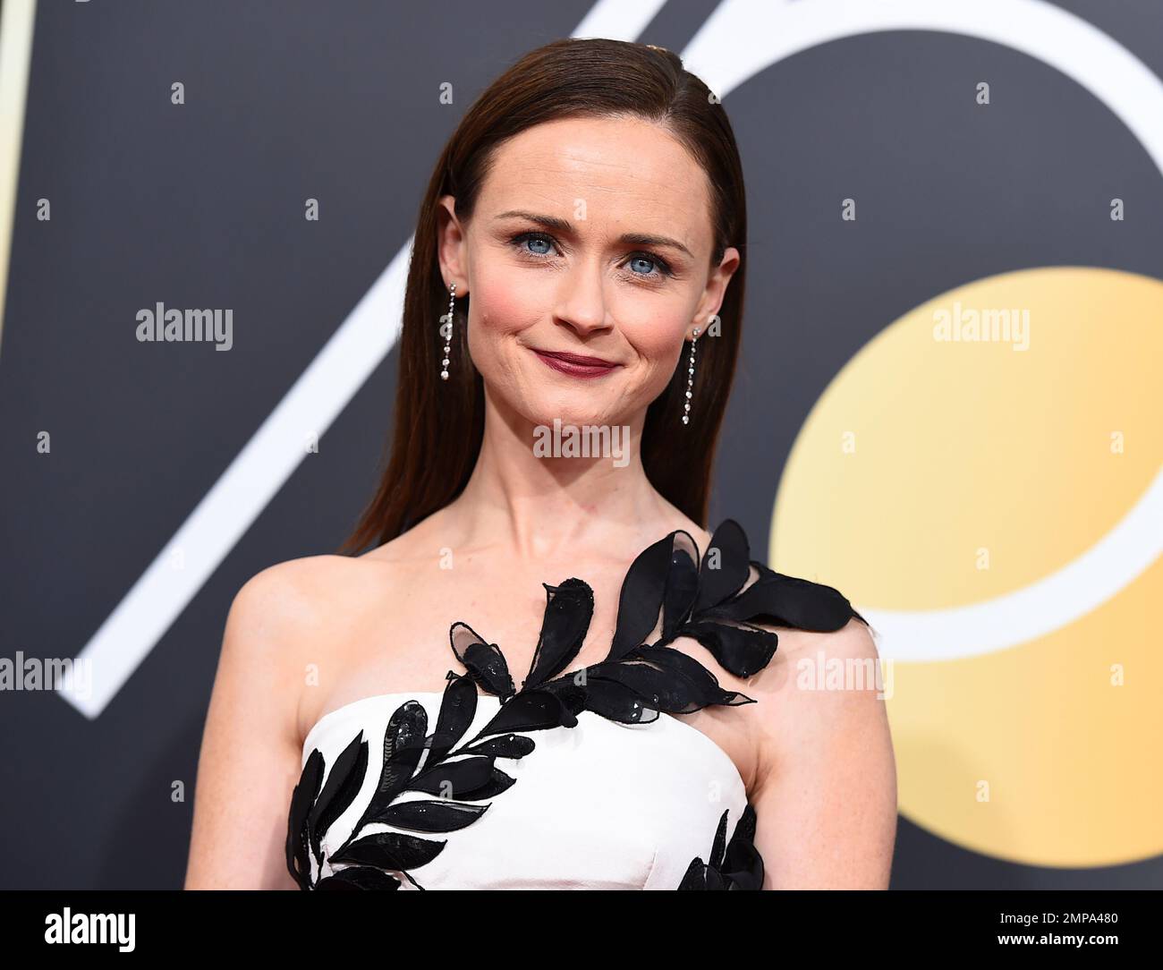 Alexis Bledel arrives at the 75th annual Golden Globe Awards at the ...