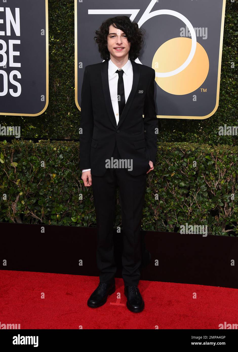 Finn Wolfhard arrives at the 75th annual Golden Globe Awards at the ...